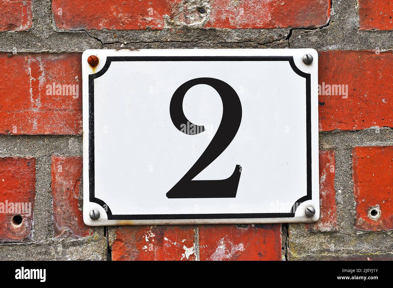 White house number plaque, showing the number two Stock Photo - Alamy