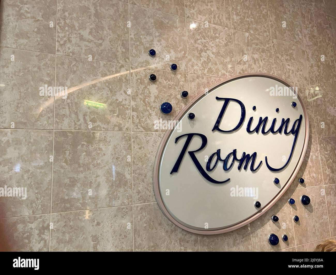 Orlando, FL USA - December 6, 2021: The dining room sign on the Royal Caribbean Cruise Ship ...