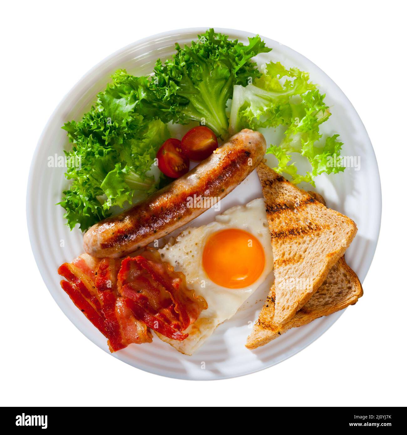 Top view of fried eggs with bacon, sausage and toasts Stock Photo - Alamy