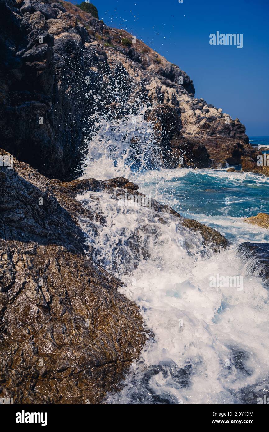 Wonderful views of the blue Mediterranean Sea. Sunny rocks, waves with ...