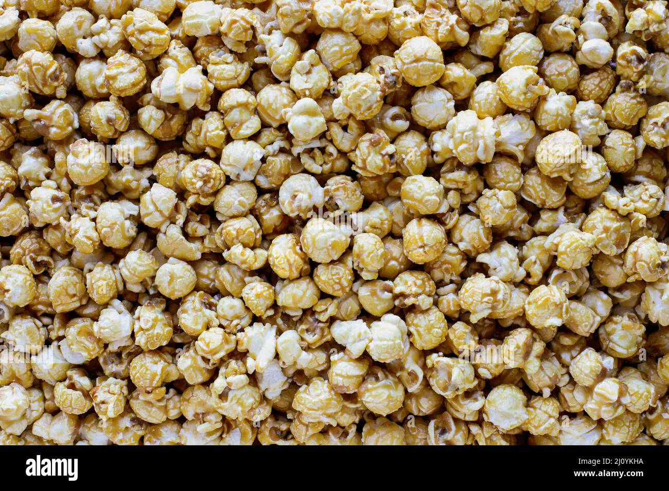 Overhead of close up shot of caramel popcorn for a popcorn background ...
