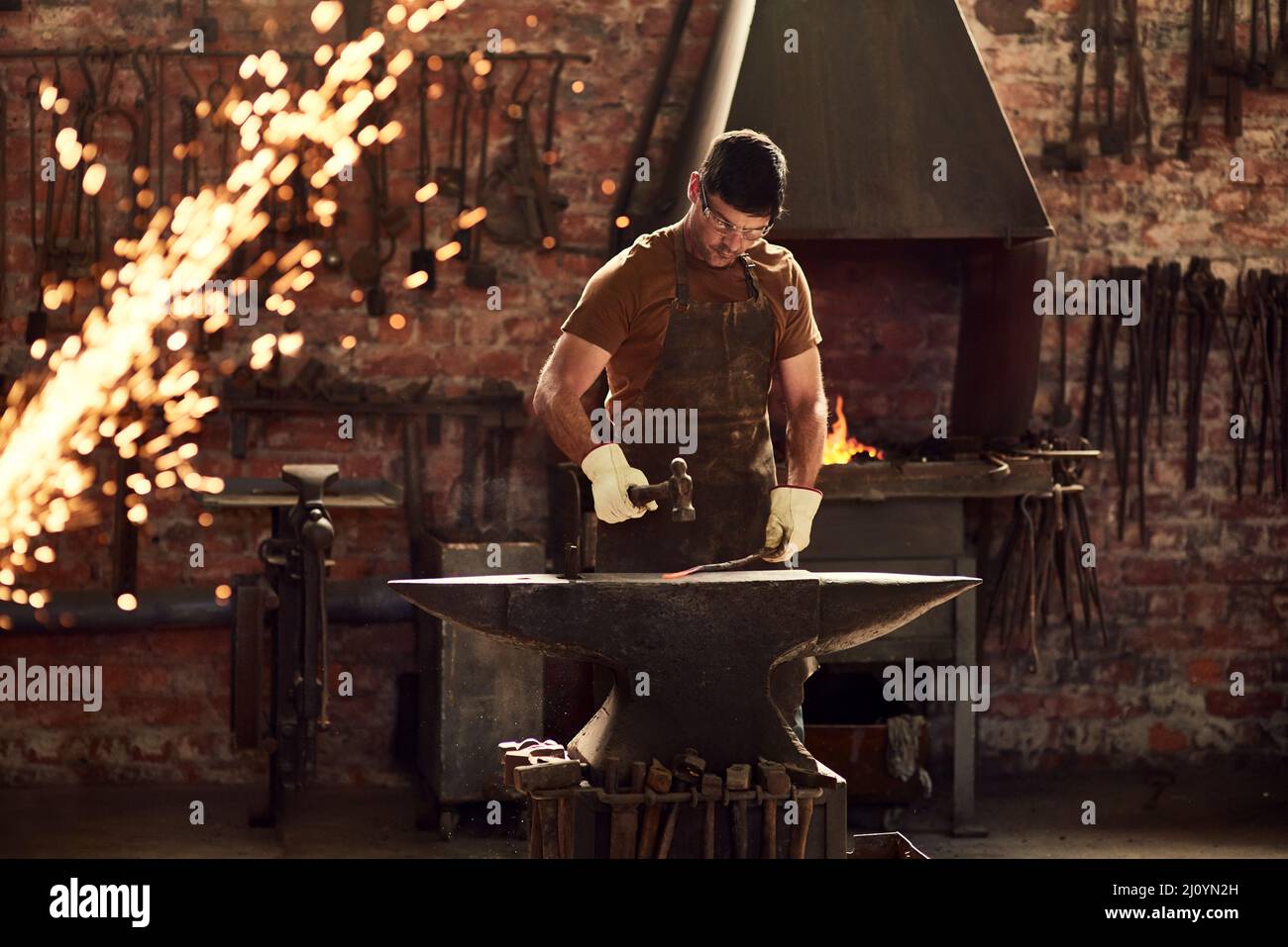 This is how metal is made strong. Cropped shot of a handsome young ...