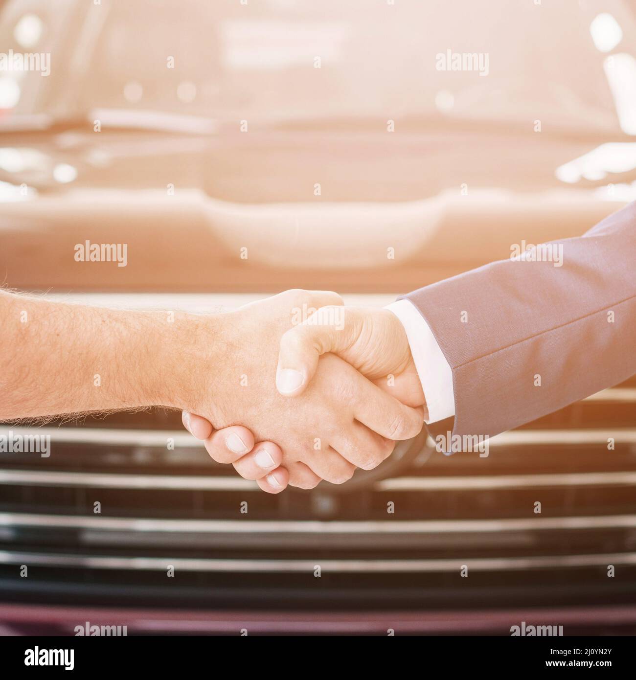 Handshake car dealership. High quality photo Stock Photo - Alamy