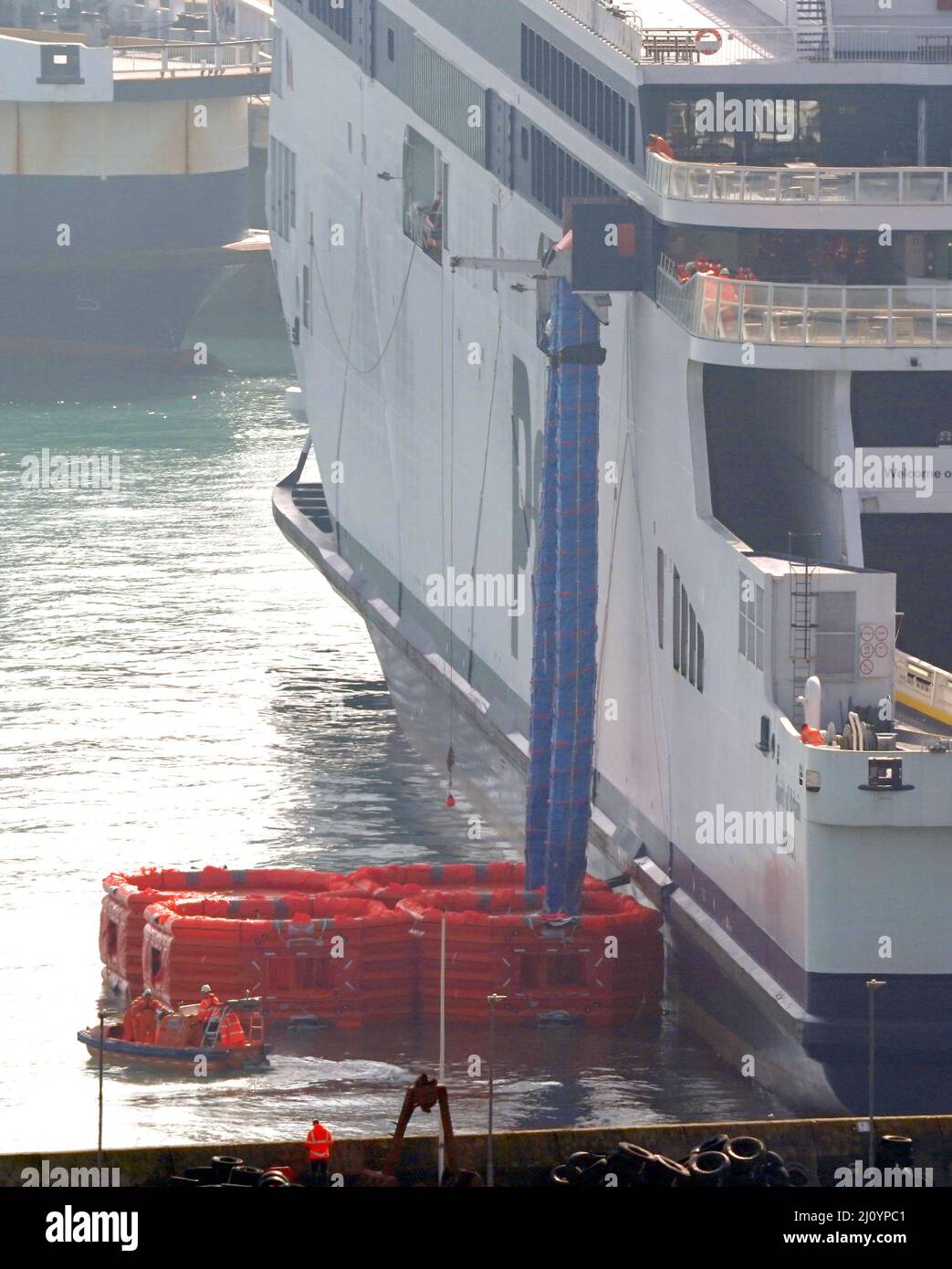 Drills are carried out using safety chutes and life rafts from the side ...