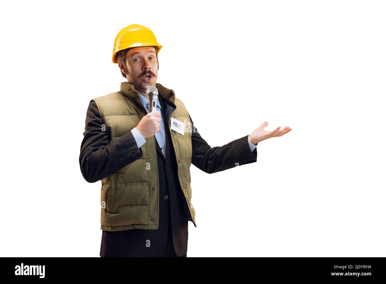 Portrait of young man in helmet, professional commentator, journalist ...