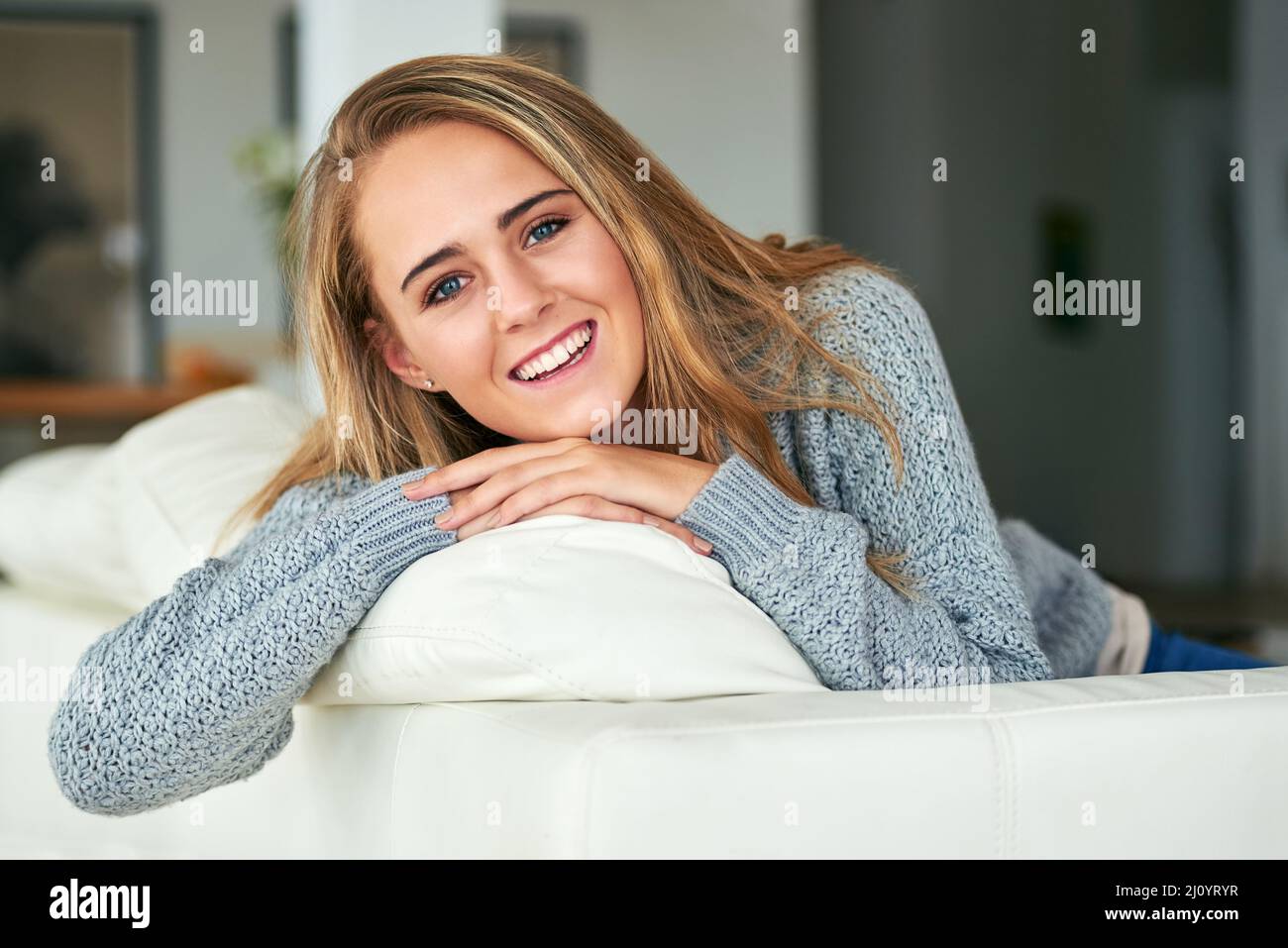 Women chilling on couch hi-res stock photography and images - Alamy