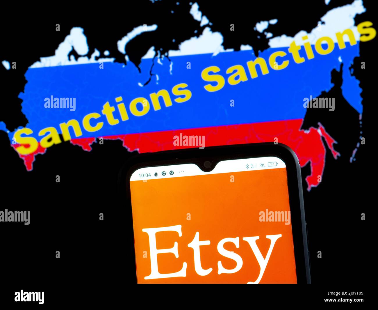 In this photo illustration, the Etsy logo is displayed on a smartphone ...