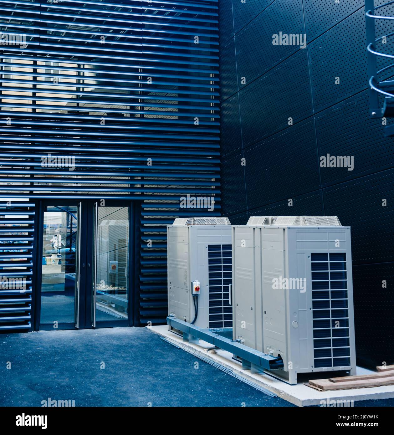 Rooftop of building with two large HVAC Heating, ventilation, and air ...