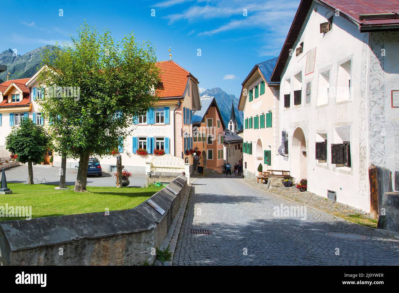 Small street of houses in village on the Swiss alps Stock Photo - Alamy