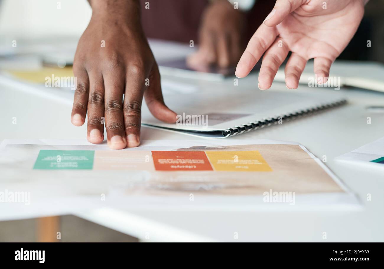 Were both hands on in our business. Shot of two unrecognizable business ...