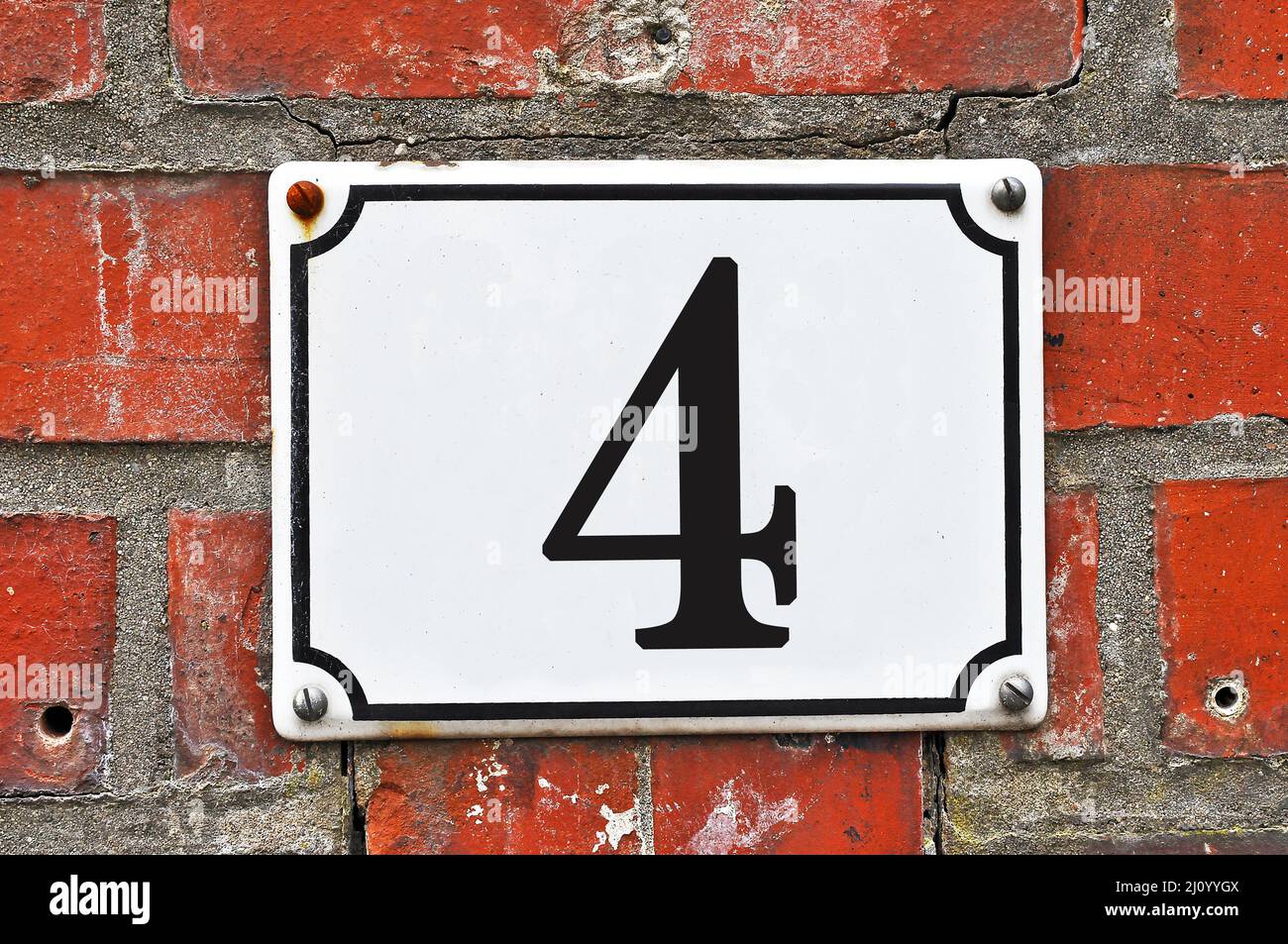 White house number plaque, showing the number four Stock Photo - Alamy