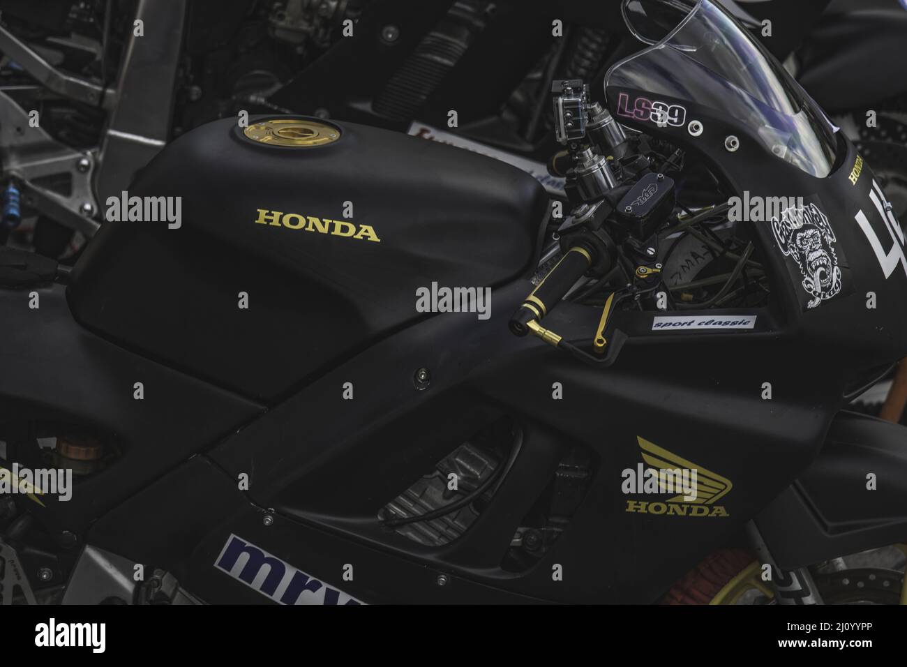 Classic racing sport motorbike running in the asphalt track Stock Photo ...