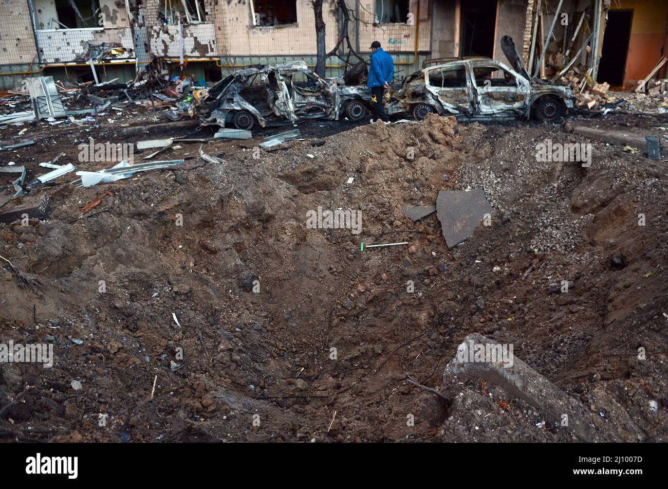 KYIV, UKRAINE - MARCH 20, 2022 - The crater from a shell is pictured in ...