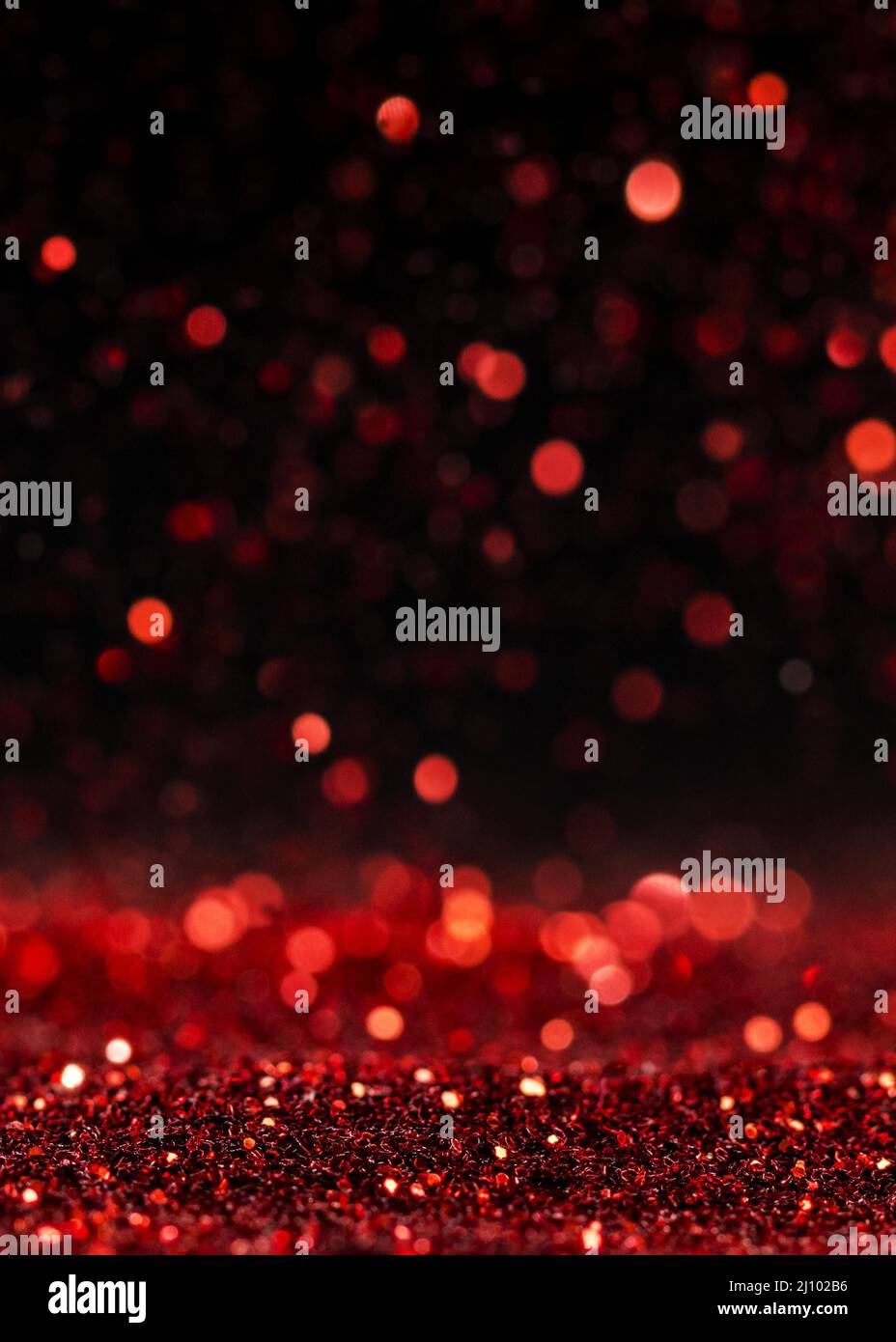 Red shimmering glitter Stock Photo - Alamy