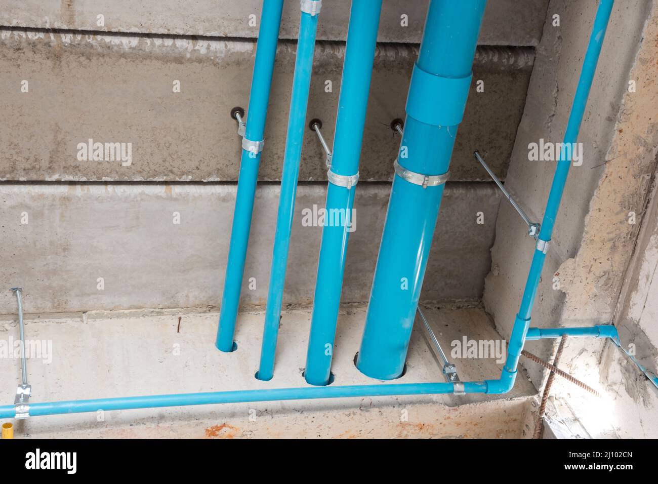 PVC tube in water piping system and draining system installation under ...