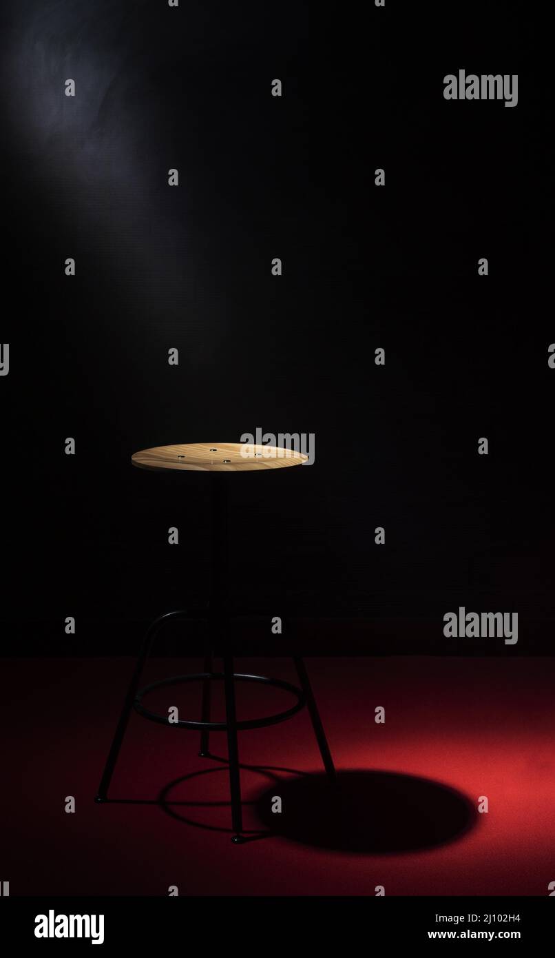 High angle chair with copy space spotlight Stock Photo - Alamy