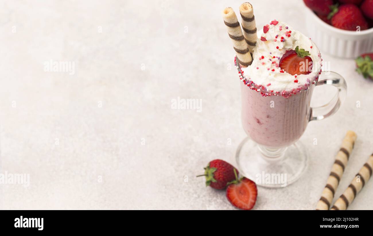 High angle strawberry milkshake with copy space Stock Photo - Alamy