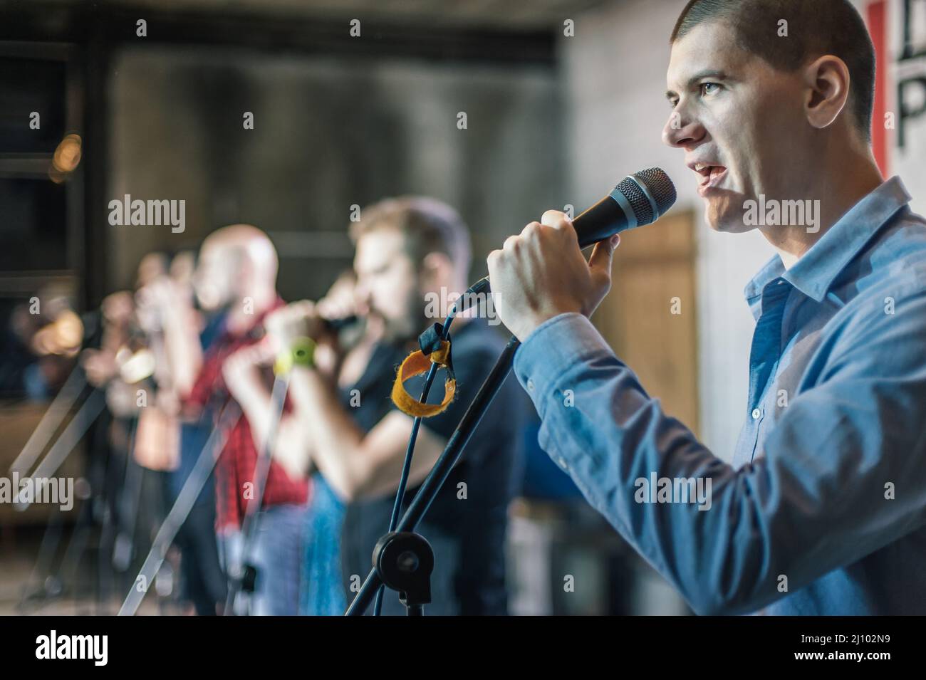 Behind the scenes. Rehearsal at theatre. Large group of actors ...