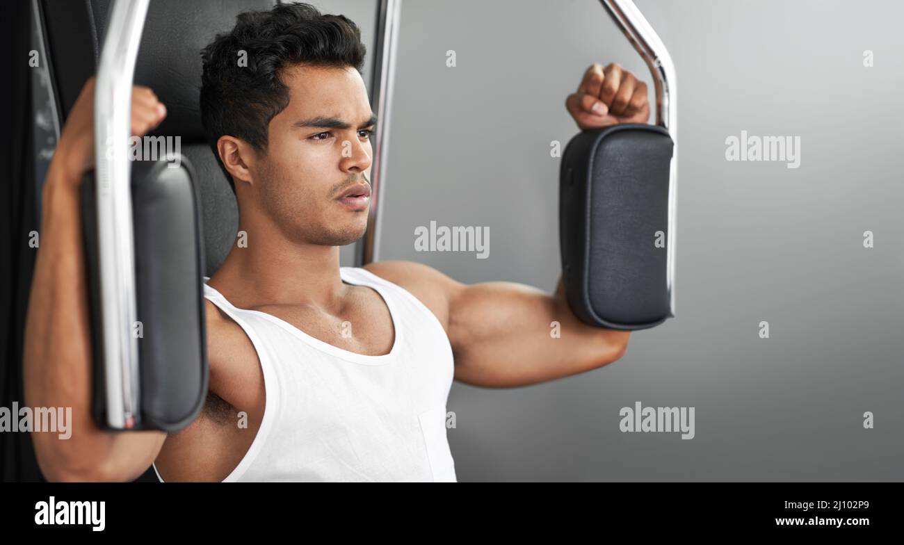 Feeling good about my body. A fitness shot of an athletic young man ...