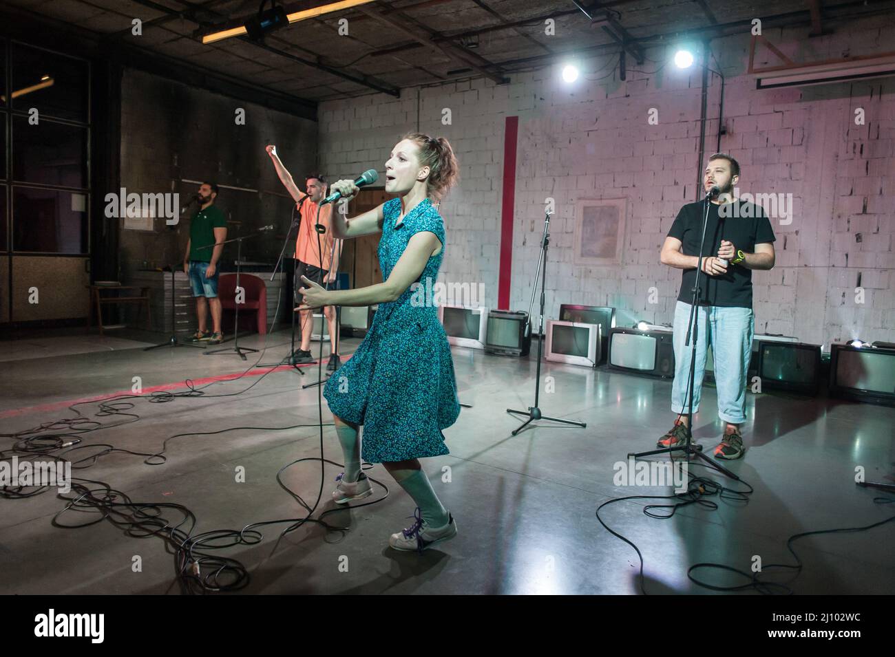 Behind the scenes. Rehearsal at theatre. Large group of actors ...