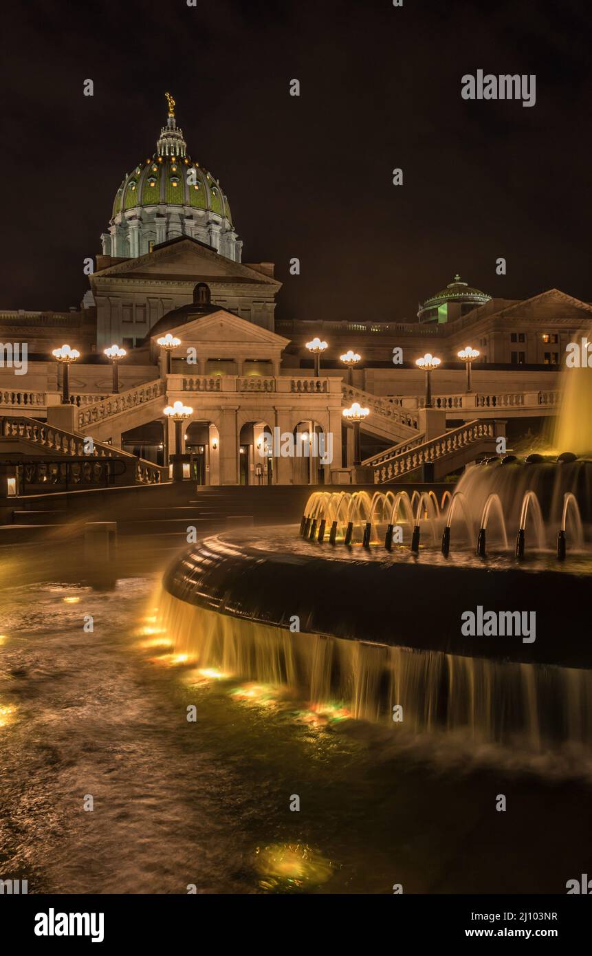 yellow water fountain and capital Stock Photo - Alamy