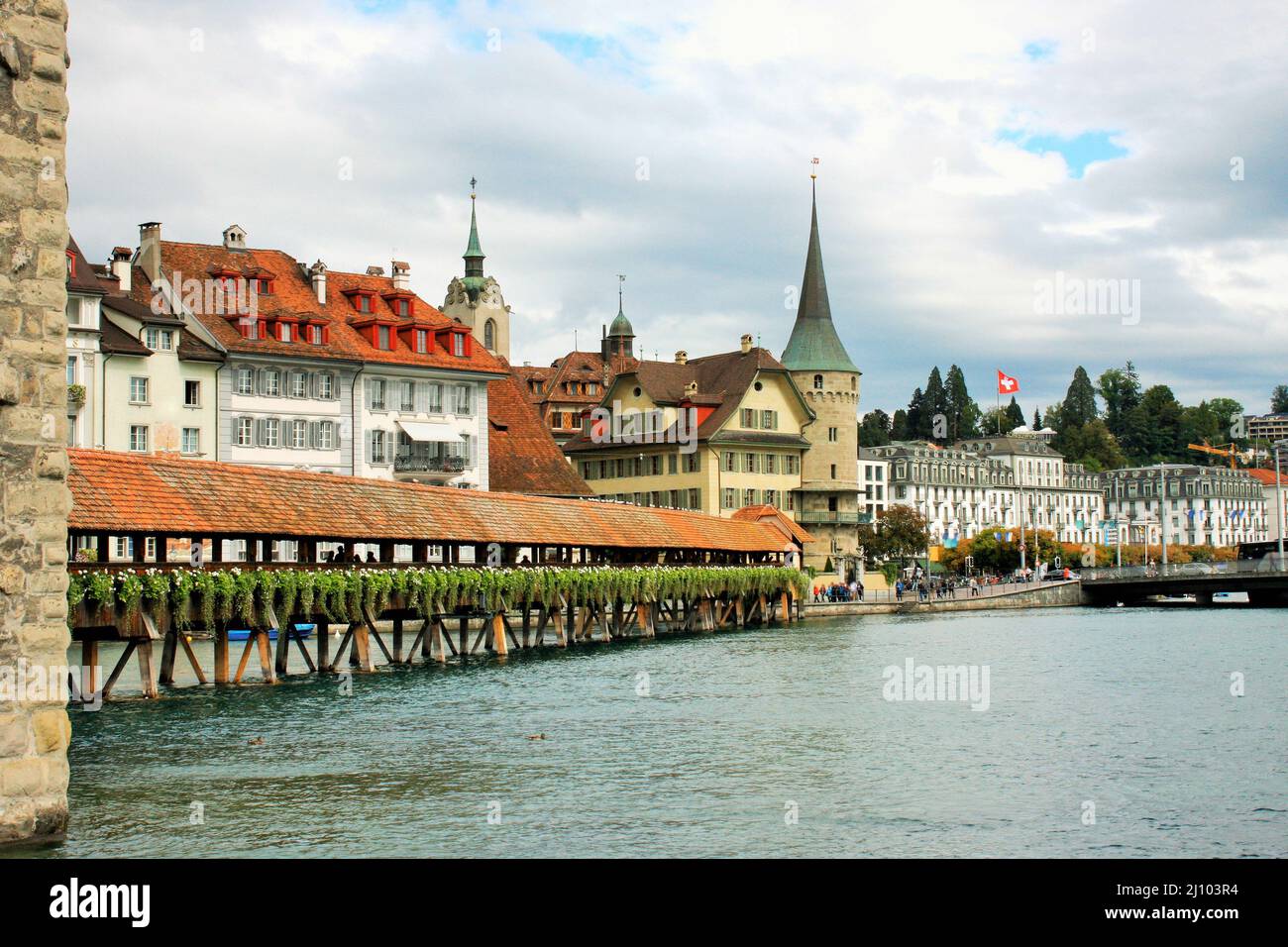 Famous Chapel bridge in Lucerne in a beautiful summer day, Switz Stock ...