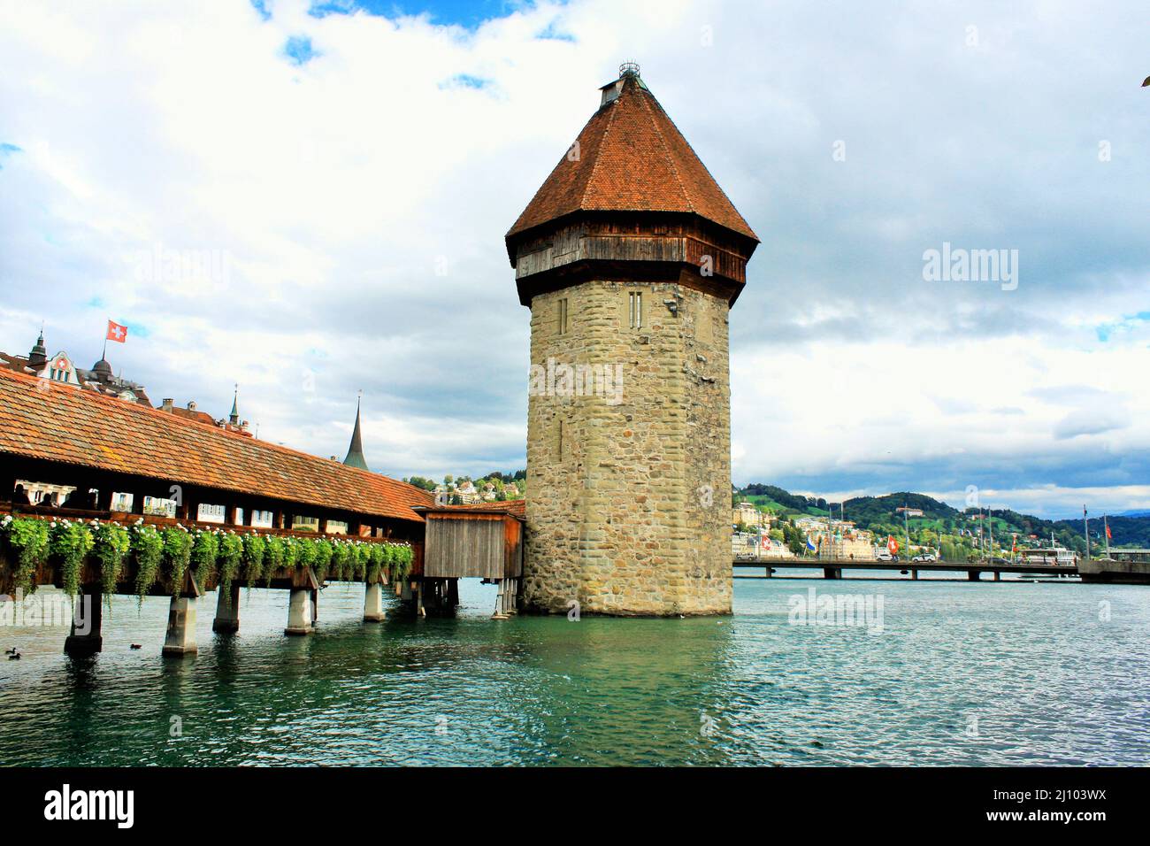 Famous Chapel bridge in Lucerne in a beautiful summer day, Switz Stock ...