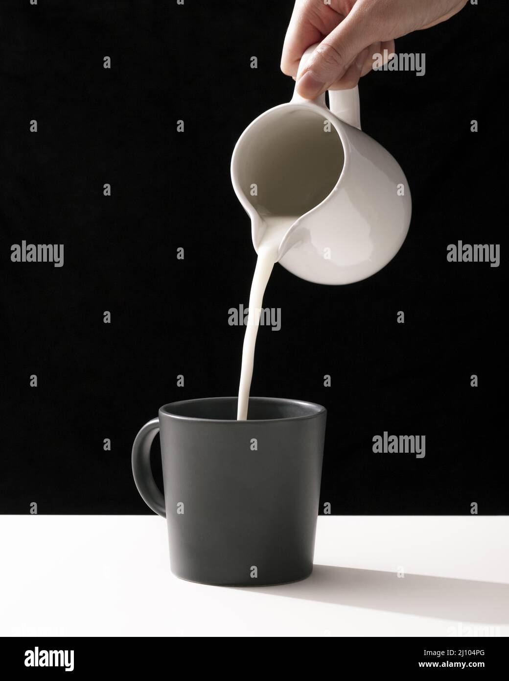 Hand pouring machine hi-res stock photography and images - Alamy
