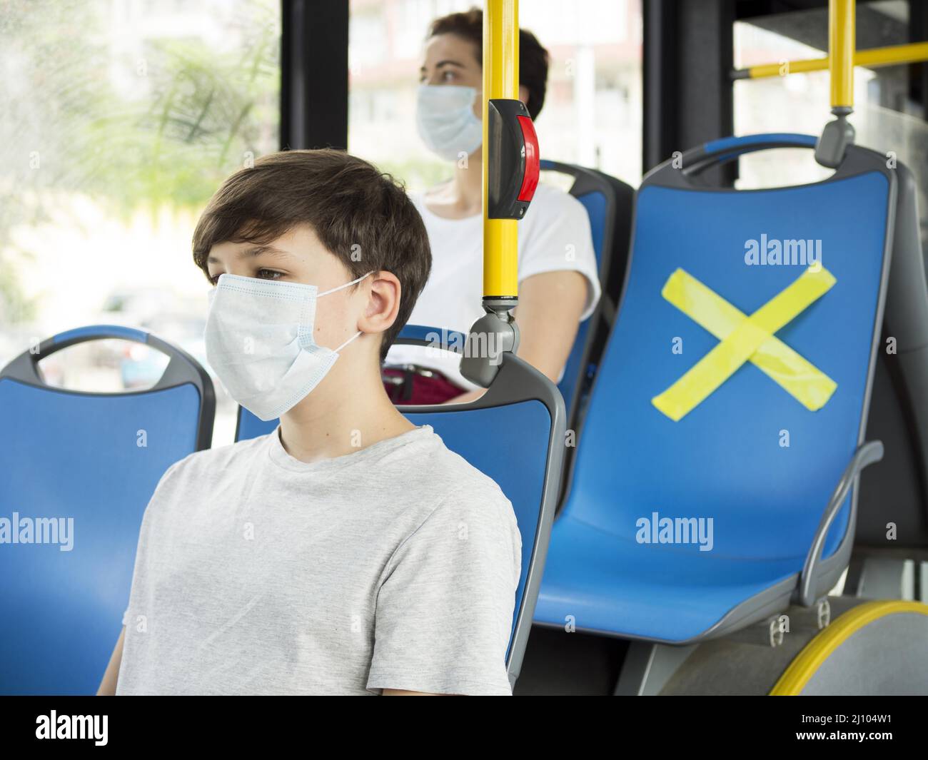 People keeping social distance bus Stock Photo - Alamy