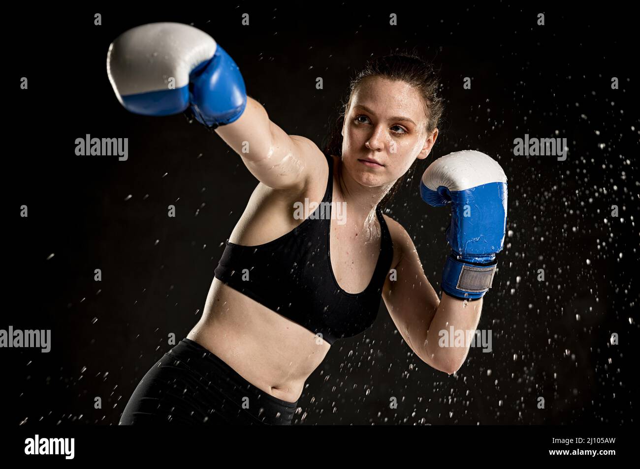 Front view female boxer posing Stock Photo - Alamy