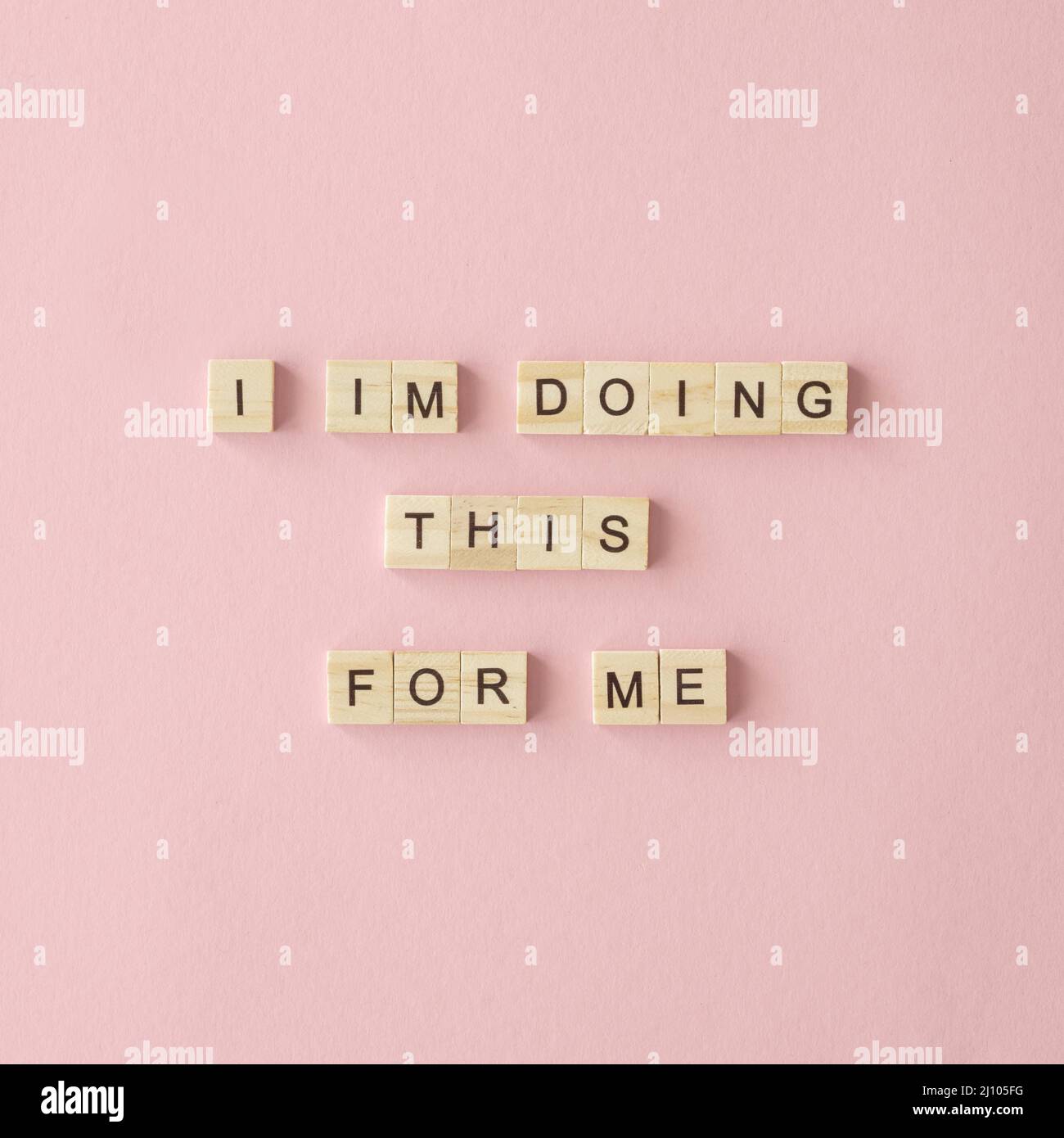 Motivational text pink background Stock Photo - Alamy
