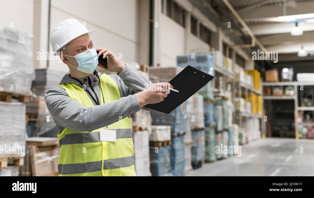 Medium shot working man hi-res stock photography and images - Alamy