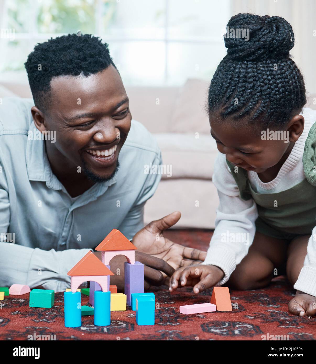 Girl learning through play hi-res stock photography and images - Alamy