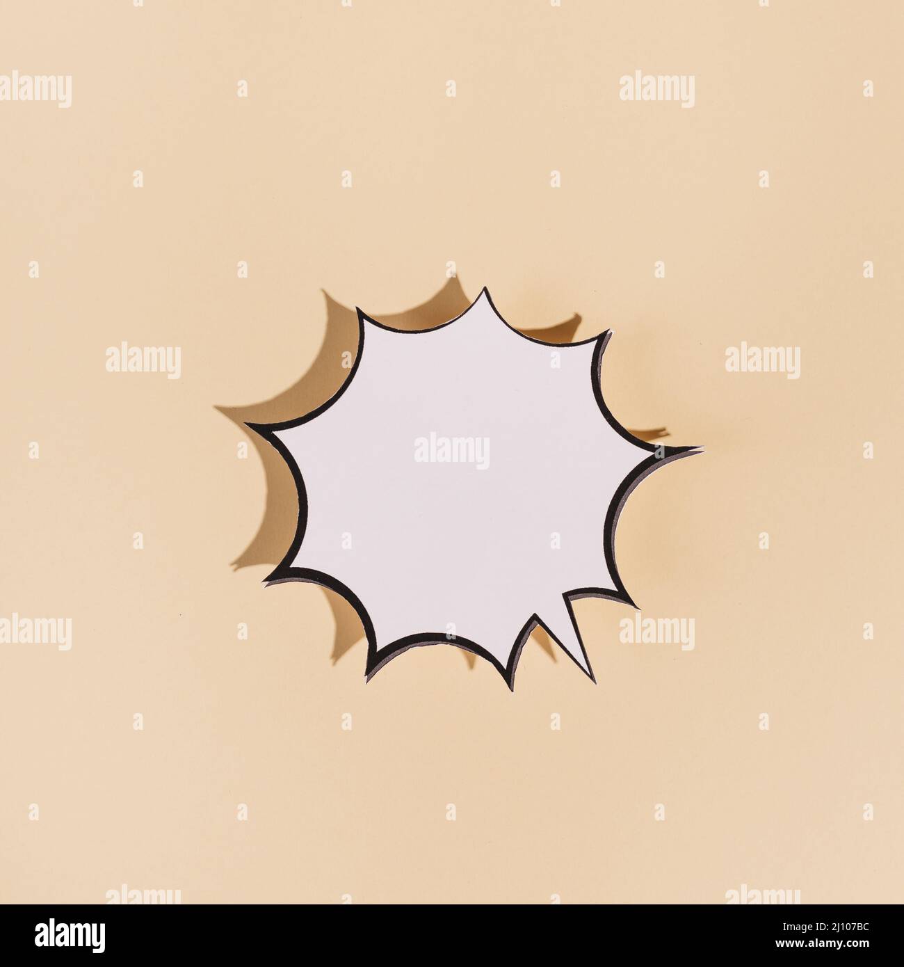 White speech bubble with black border text beige background Stock Photo ...