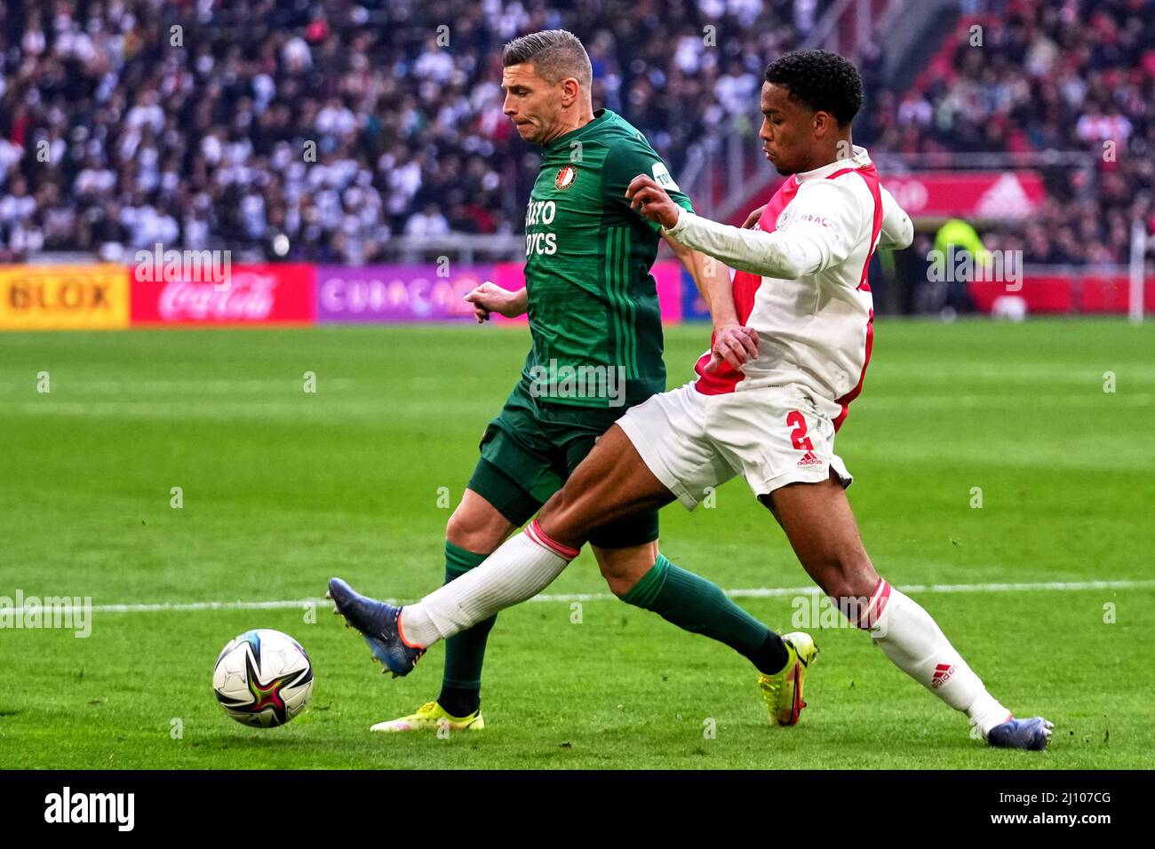 Amsterdam - Bryan Linssen of Feyenoord, Jurrien Timber of Ajax during ...