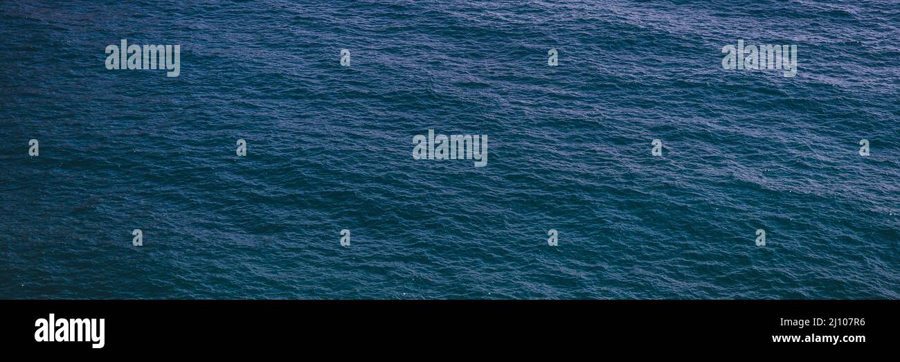 ocean or sea water textured dark blue background. surface and texture ...