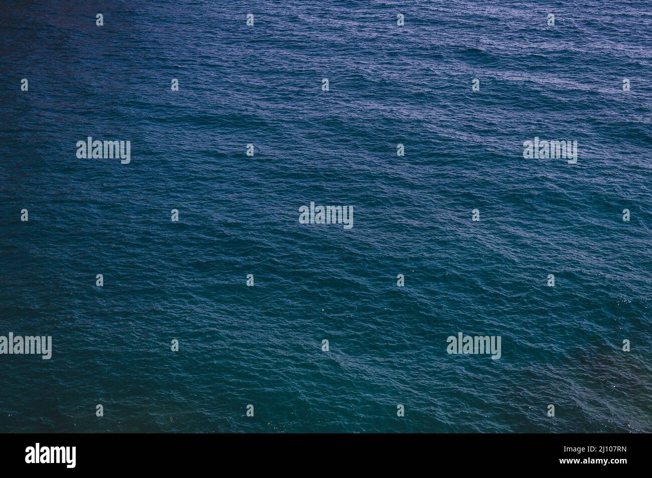 ocean or sea water textured dark blue background. surface and texture ...