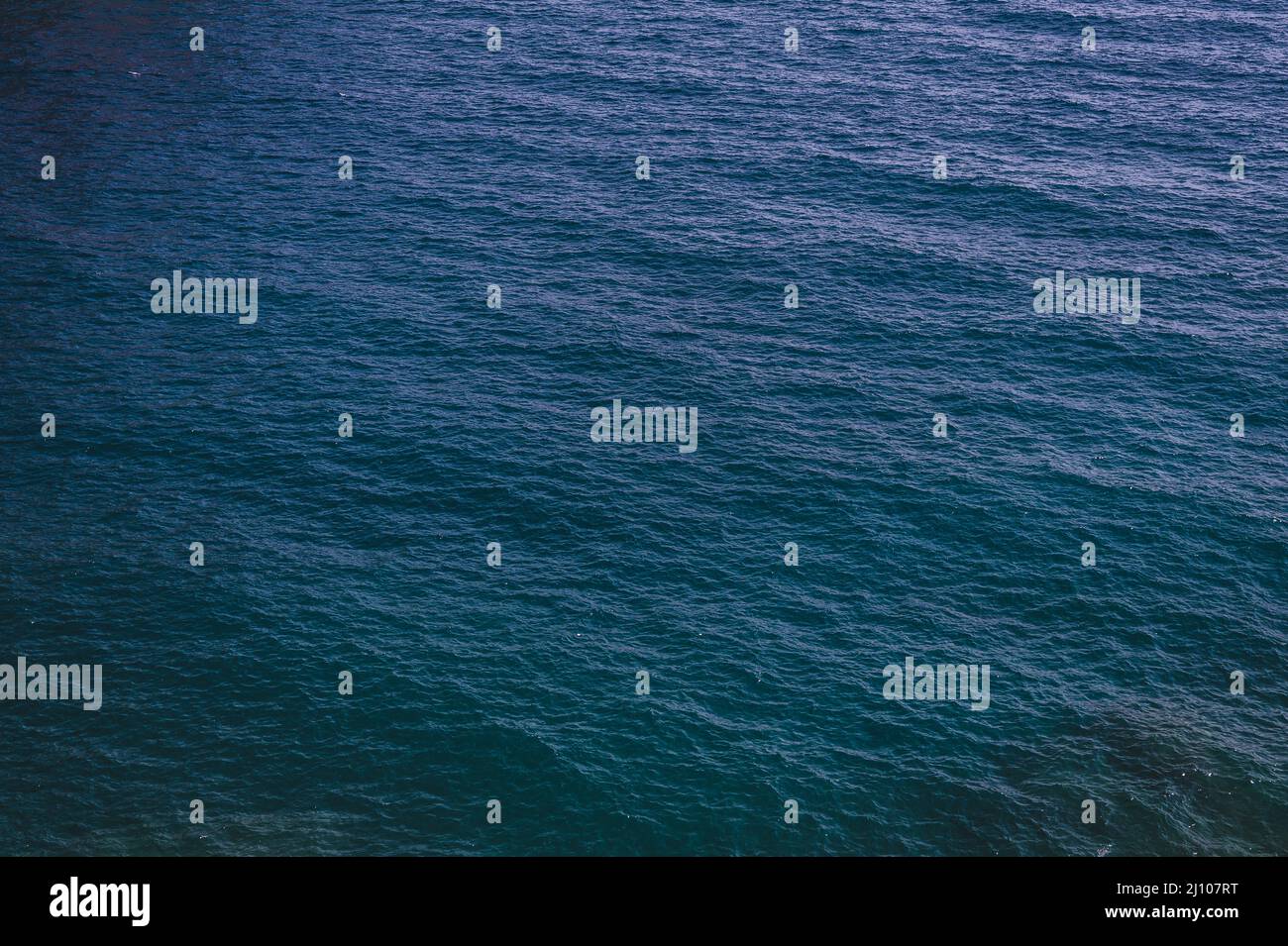ocean or sea water textured dark blue background. surface and texture ...
