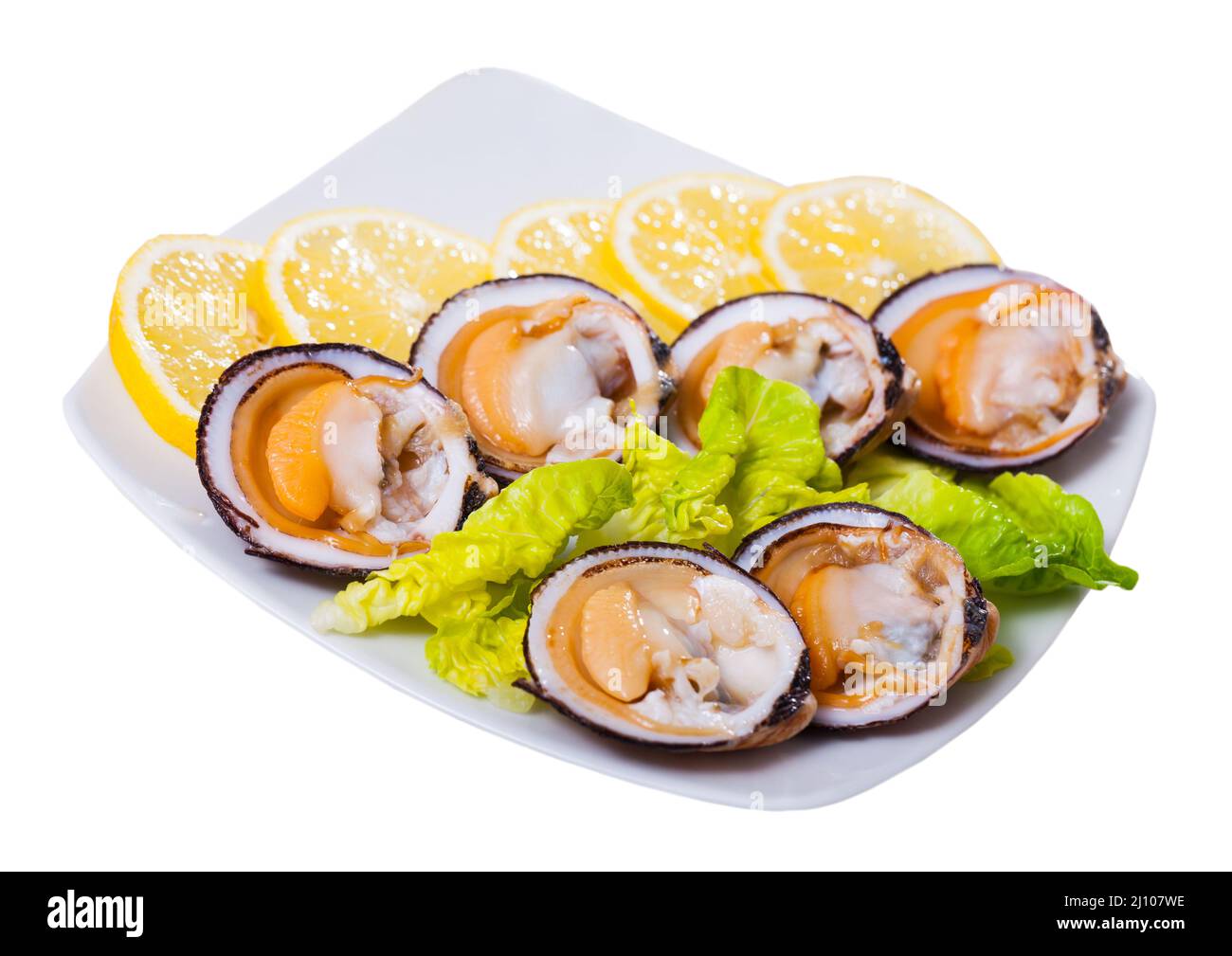 Fresh bivalve mussels with lemon Stock Photo - Alamy