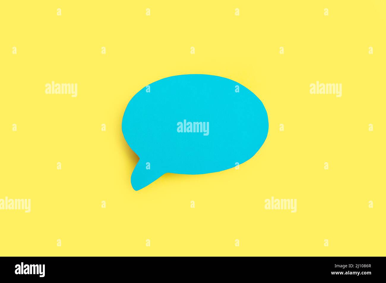 Blank blue speech bubble with copy space on a yellow background Stock ...