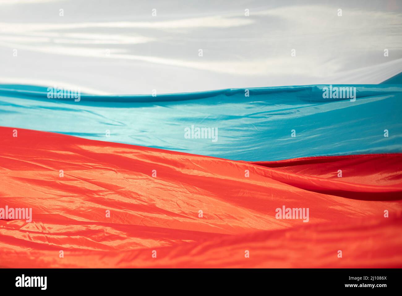 Russian wave flag. Fabric in colors of state flag of Russian Federation ...