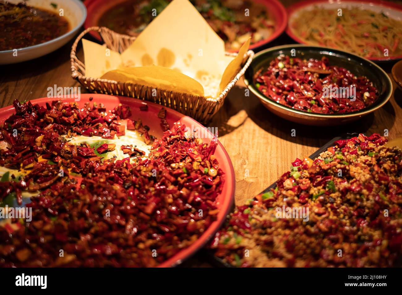 Closeup of traditional Chinese food in plates on the table Stock Photo ...