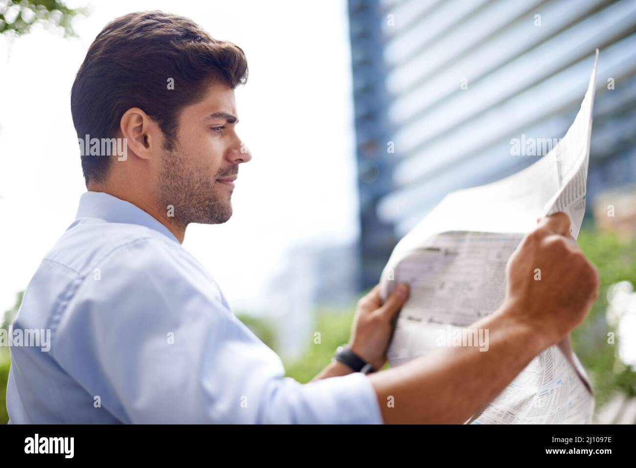 Person sitting reading paper hi-res stock photography and images - Alamy