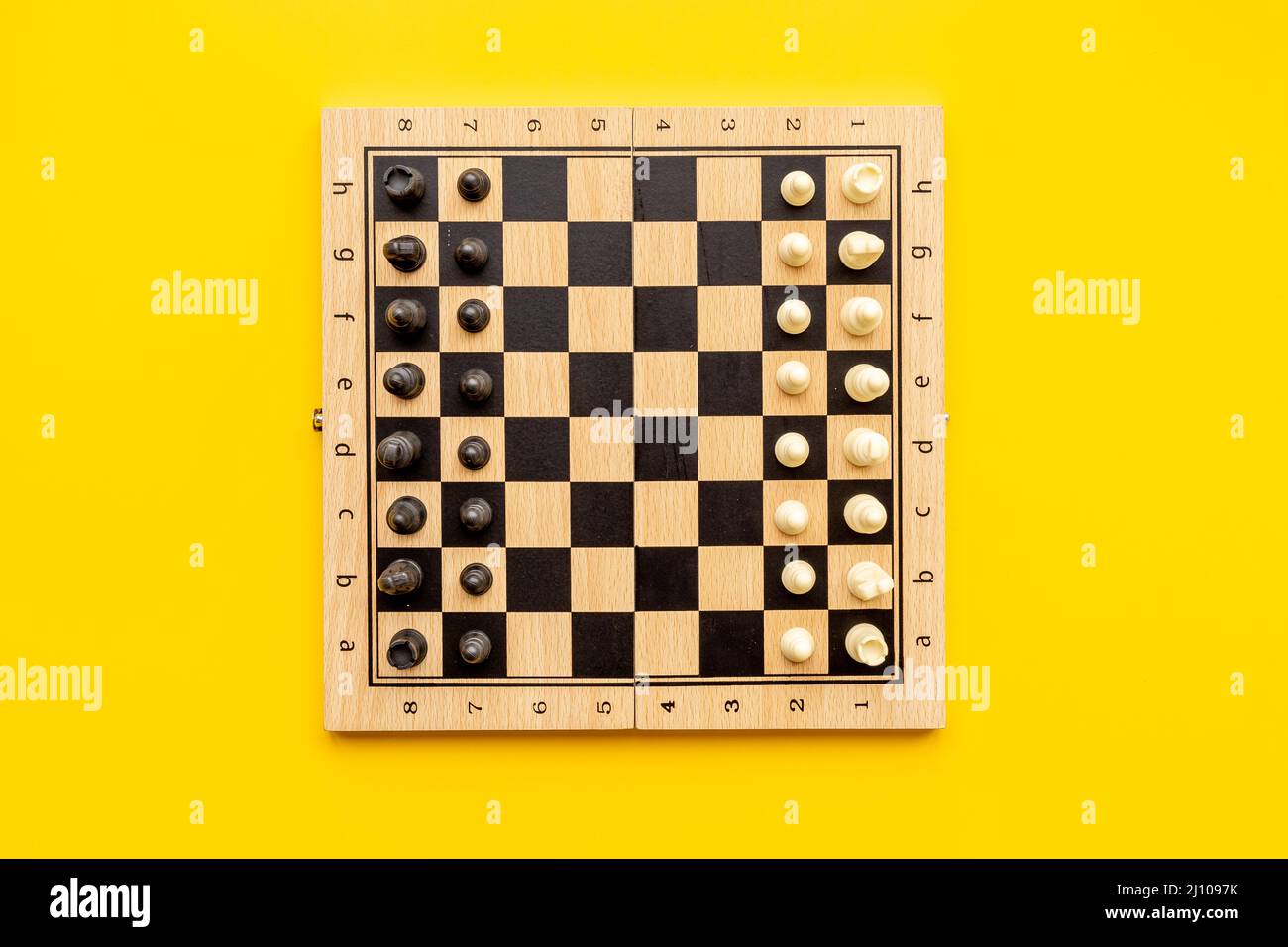 Chess pieces battle on chessboard. Teamwork concept Stock Photo - Alamy