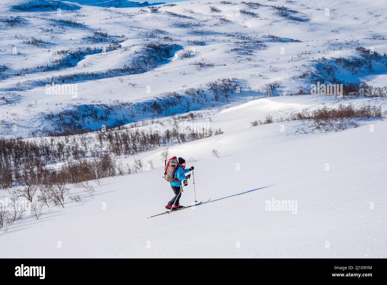 A single skier Ski touring in the mountains of Norway Stock Photo - Alamy