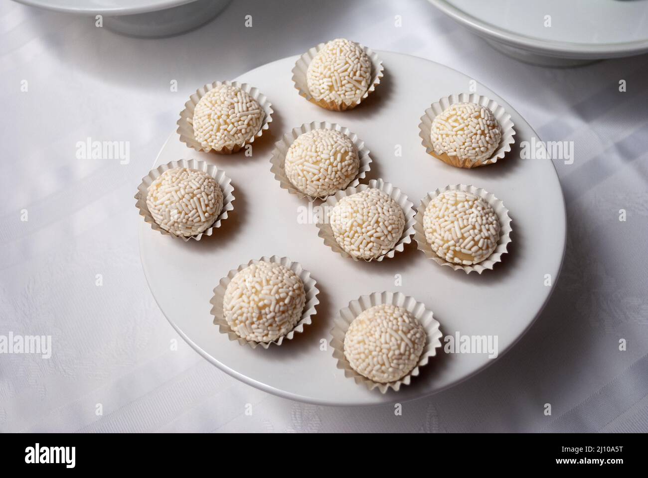 Delicate female hand taking hi-res stock photography and images - Alamy
