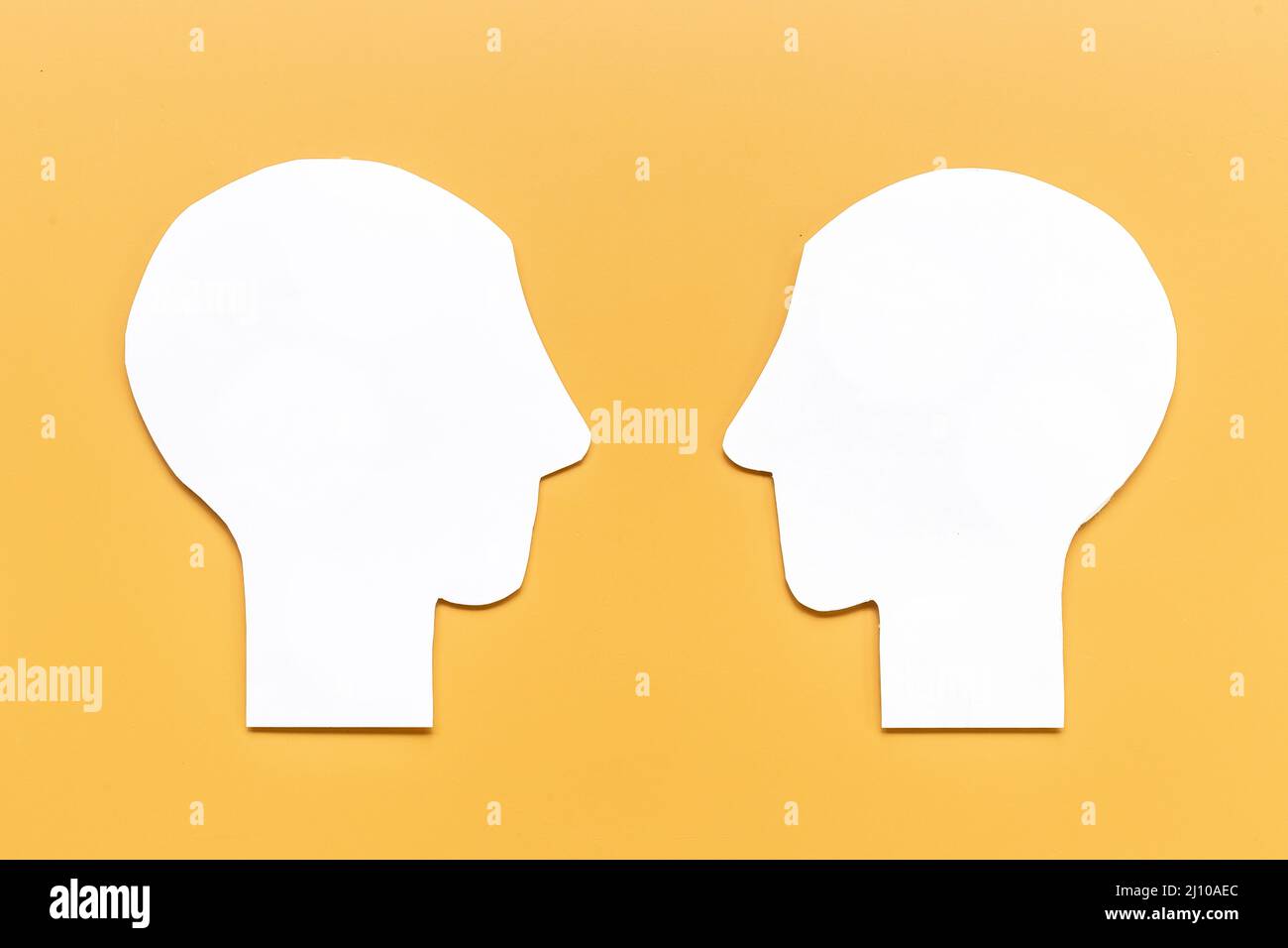 Two shape of men head - connection and communication concept Stock ...