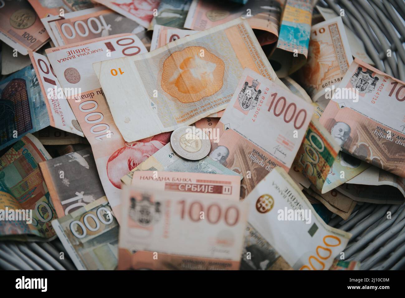 Closeup shot of the 50, 1000 and 2000 Serbian Dinara banknotes and ...