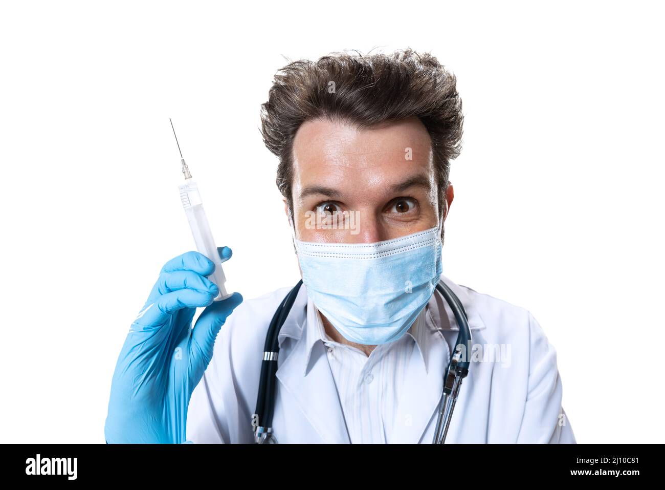 Ready for injection. Male young doctor with stethoscope and face mask ...