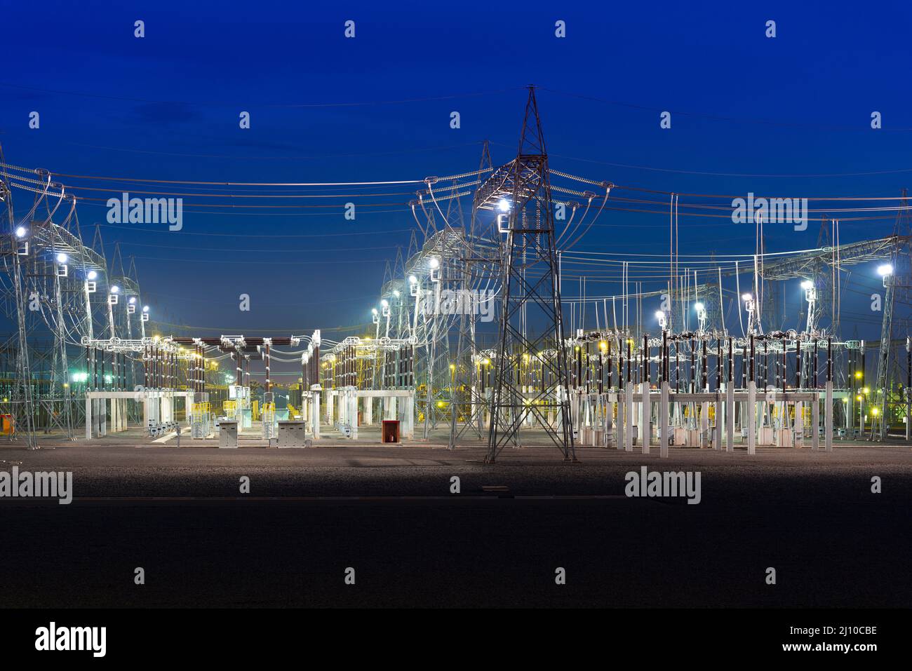 View of an electric substation at night Stock Photo - Alamy
